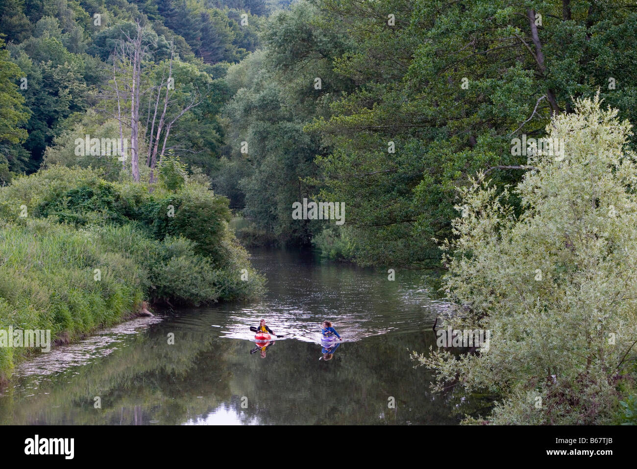 Canoe paddlers on the river, Fraenkische Saale, near Bad Kissingen ...