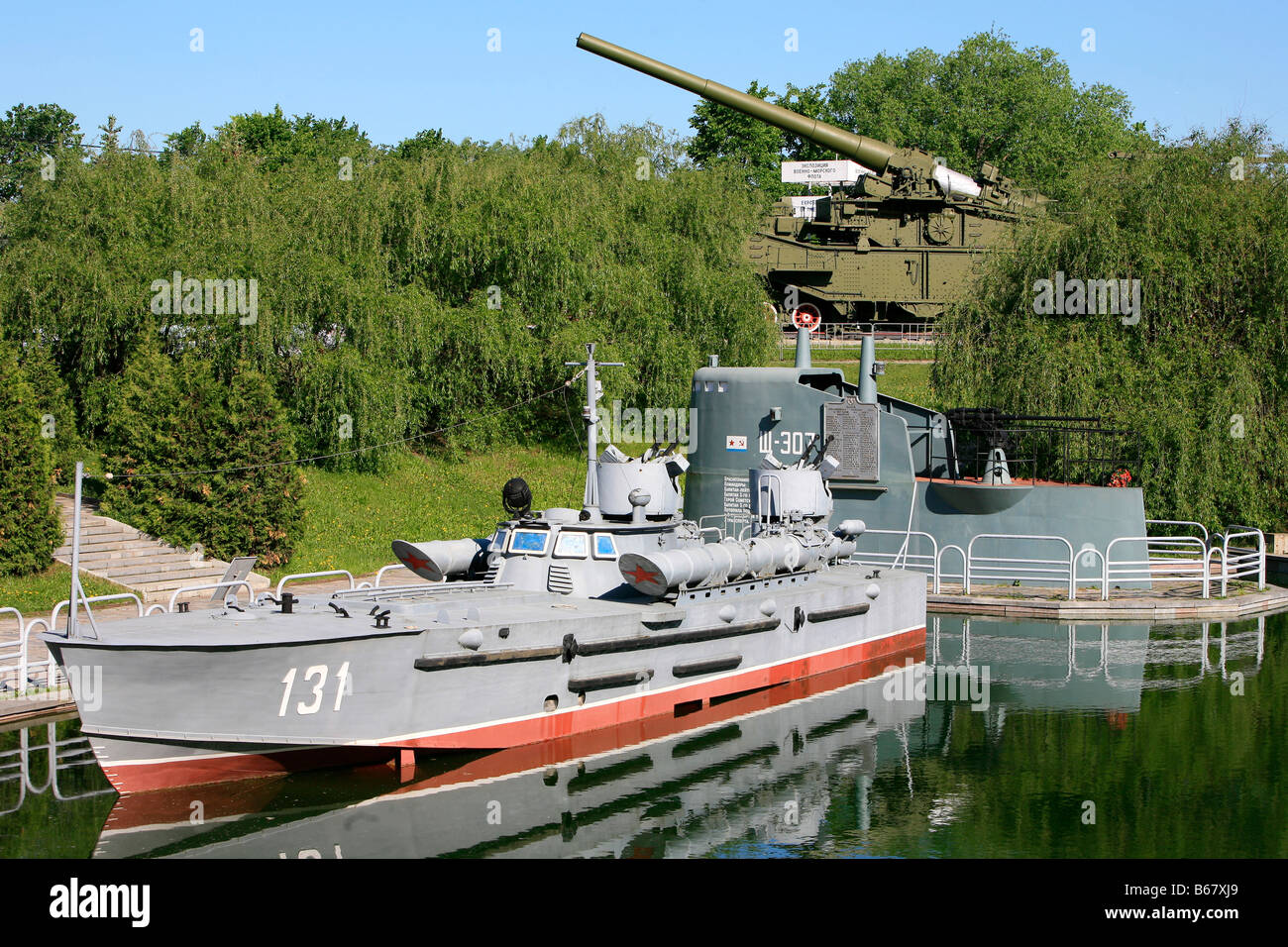 Soviet World War II ship, submarine conning tower and cannon on train ...
