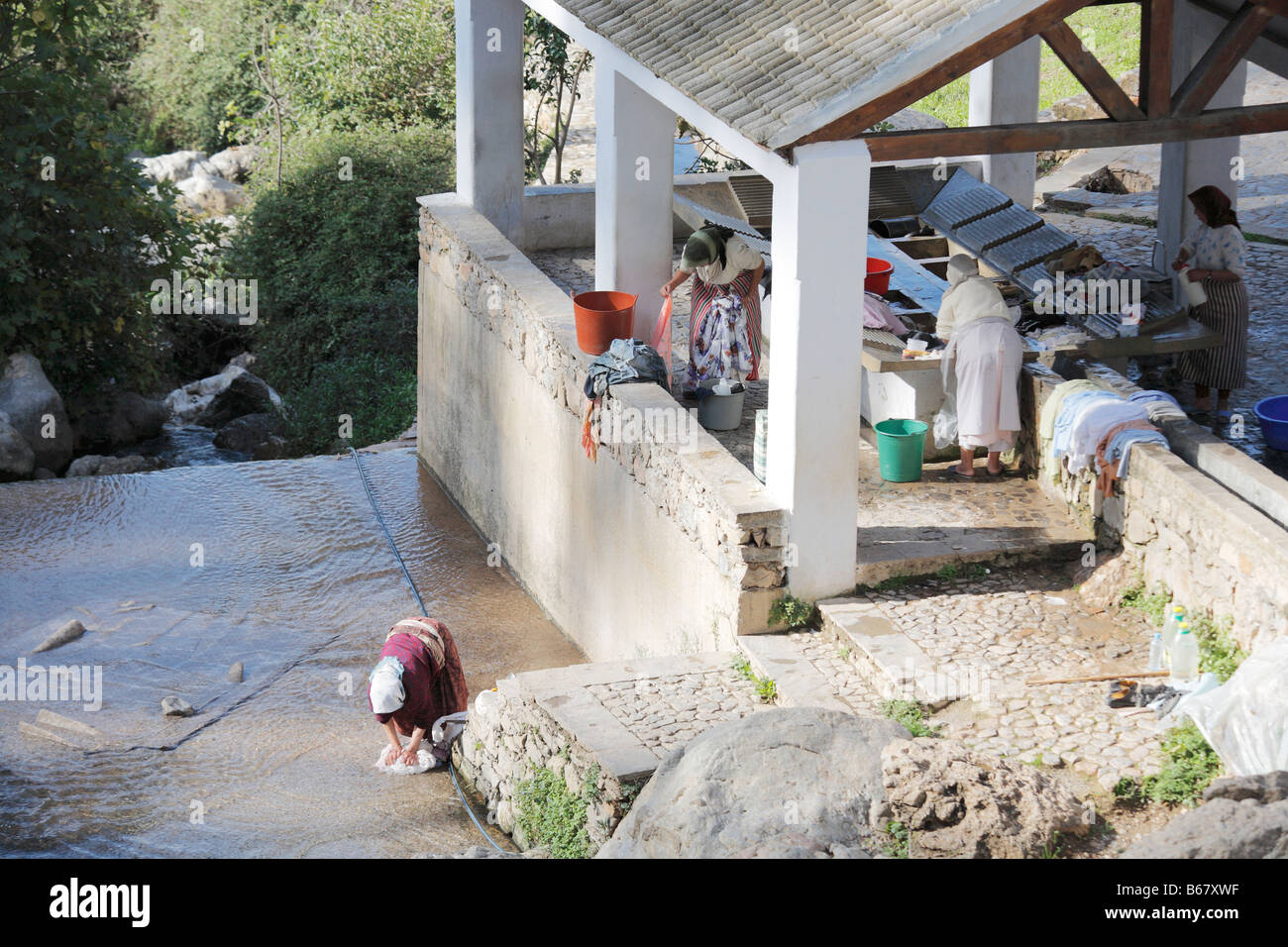 Women doing laundry in the river, Chefchaouen, Medina, Morocco, Africa ...
