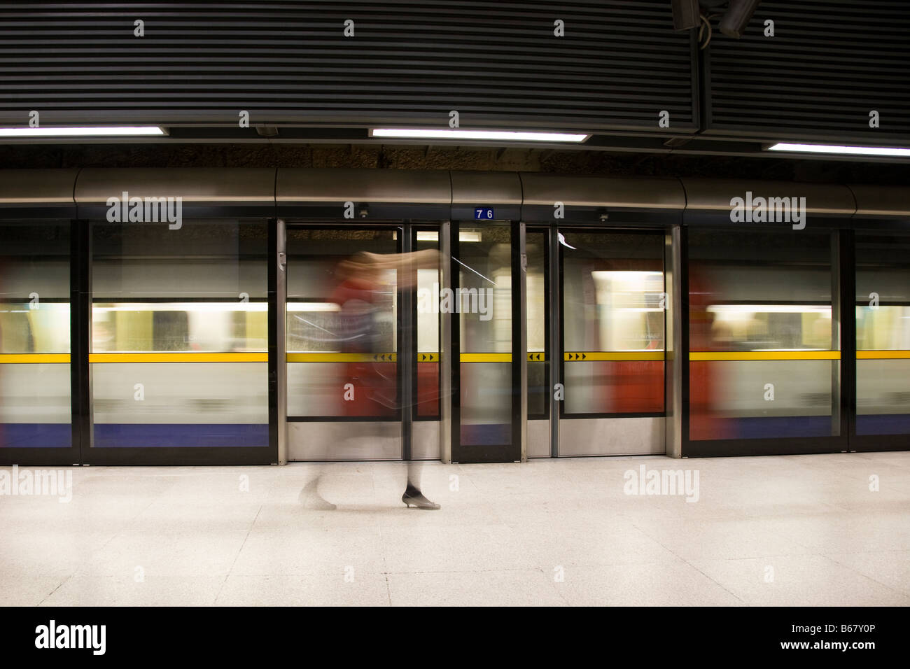 Underground tube train (Jubilee Line) and platform at Canary Wharf ...