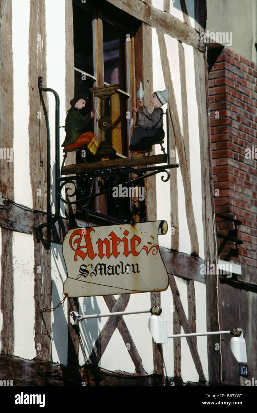 French shop sign in Normandy Stock Photo - Alamy