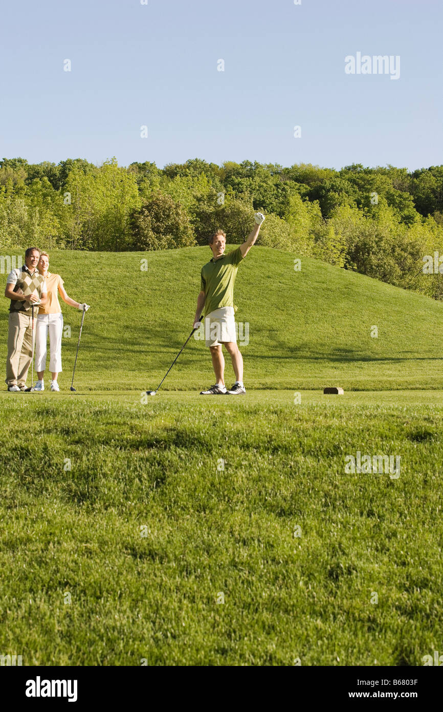 Group of People Golfing Stock Photo - Alamy