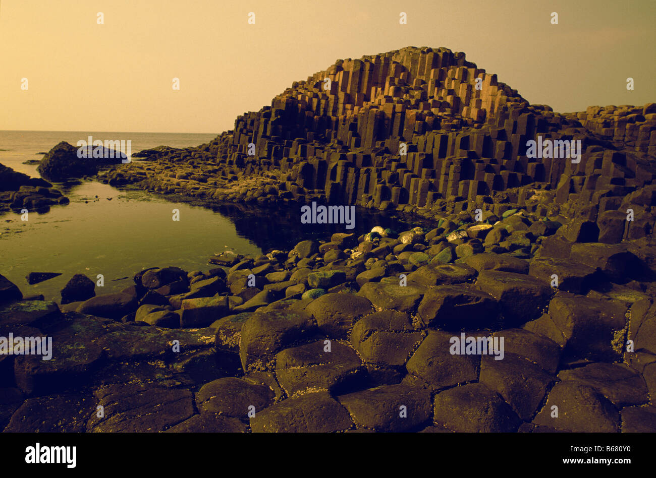 Sunset view of Basalt Lava at Giant's Causeway, Antrim, Northern ...