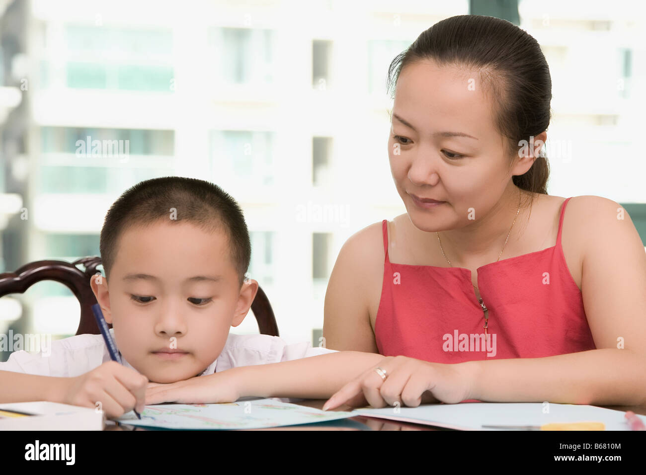 Asian parents teaching their kids hi-res stock photography and images ...