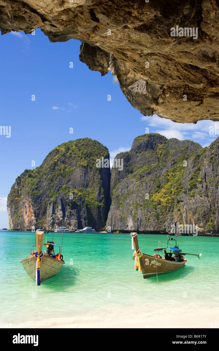 Two boats anchoring in the Maya Bay, a beautiful scenic lagoon, famous ...