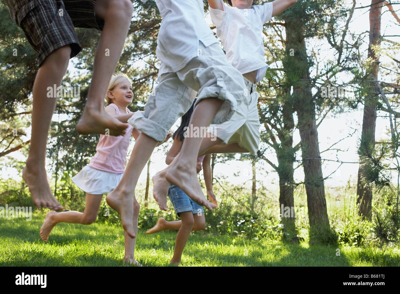 Group Happy Little Kids Running High Resolution Stock Photography and ...