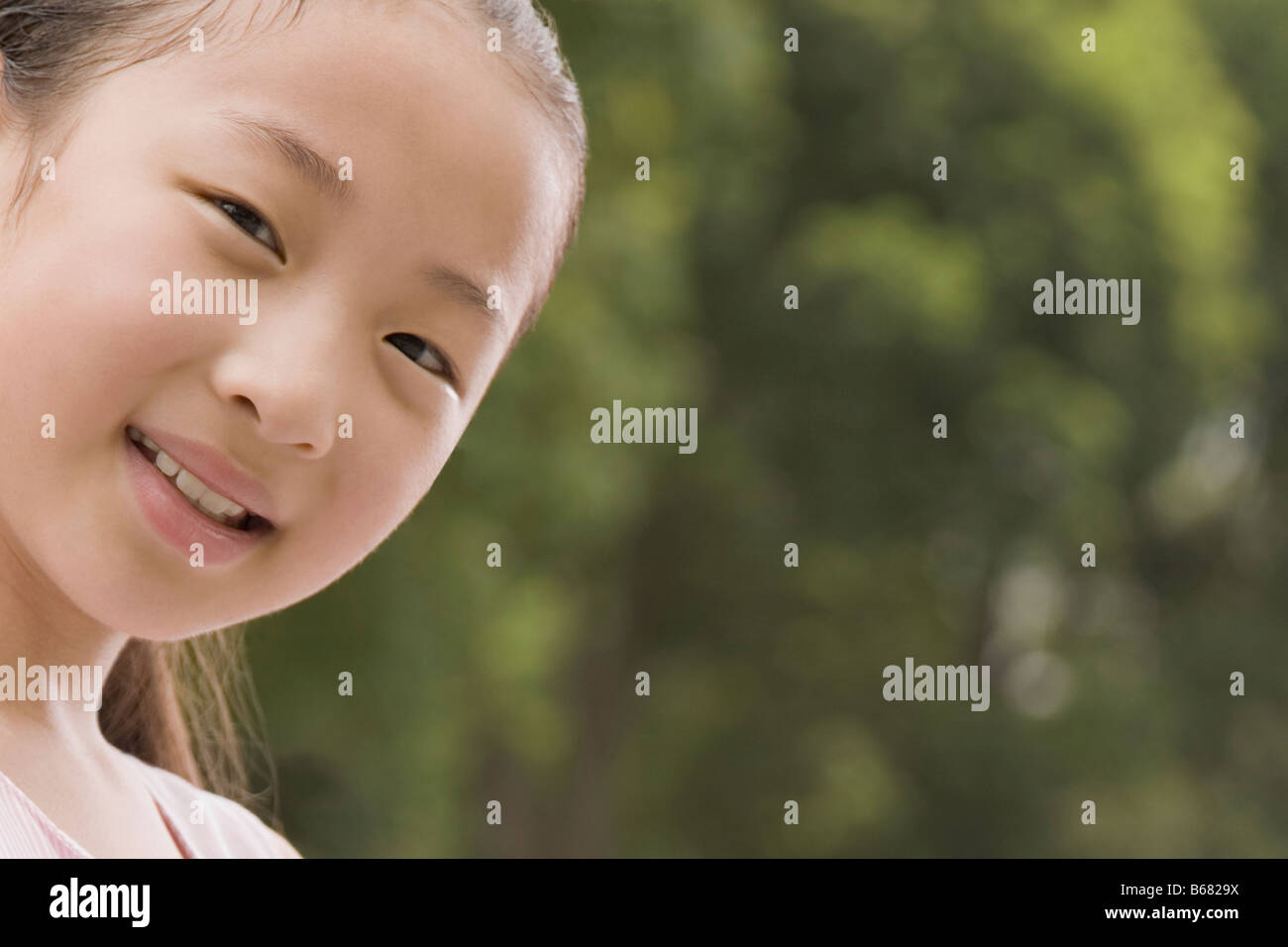 Portrait of a girl smiling Stock Photo - Alamy