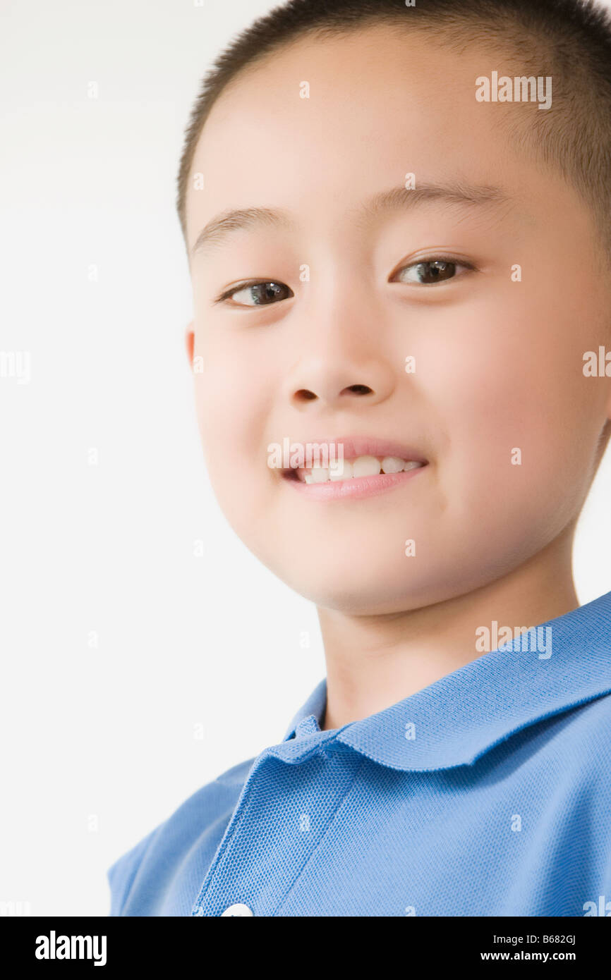 Portrait of a boy smiling Stock Photo - Alamy