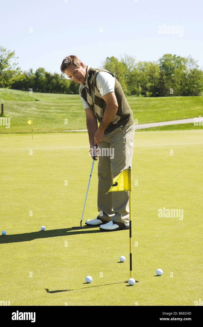 Old man putting on clothes hi-res stock photography and images - Alamy