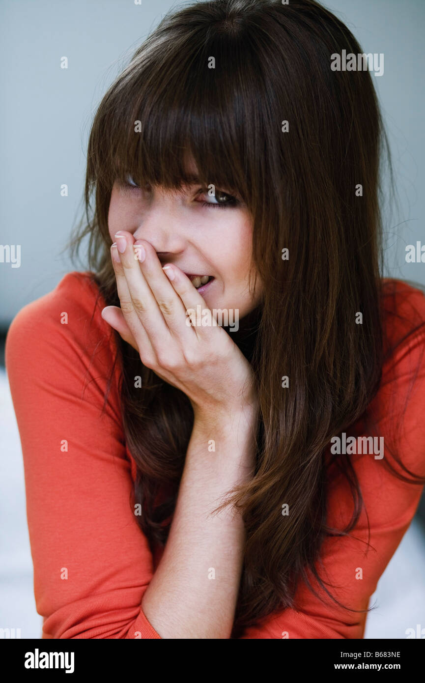 Portrait of Woman Giggling Stock Photo - Alamy