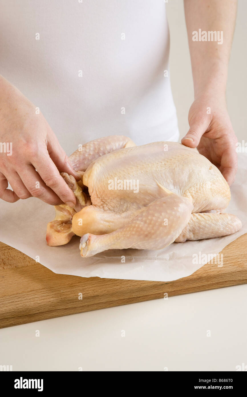 Lady preparing chicken hi-res stock photography and images - Alamy