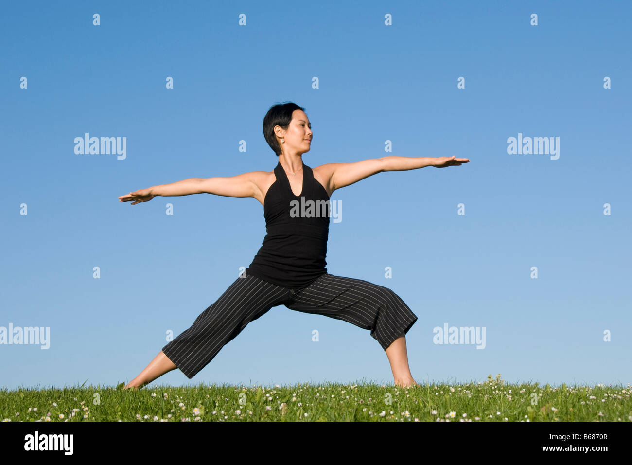 Woman Practicing Yoga Stock Photo - Alamy