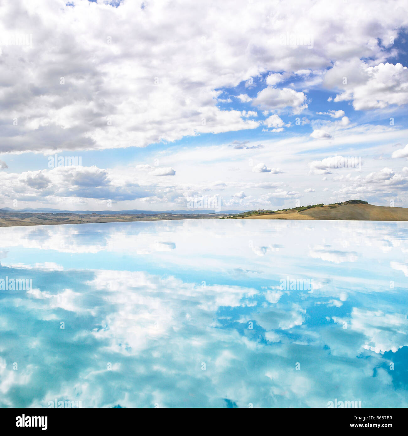 Reflection of sky in swimming pool Stock Photo - Alamy