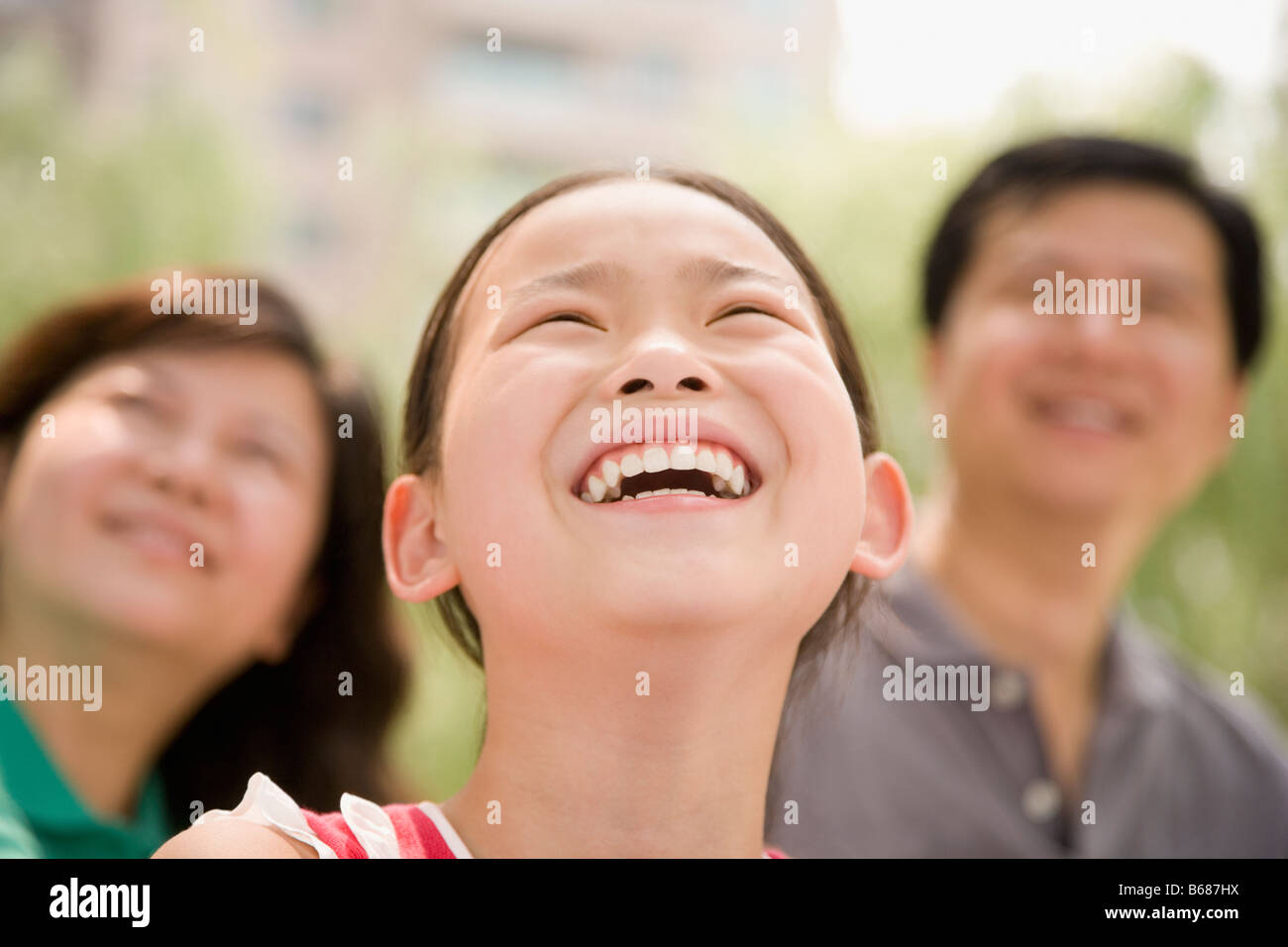 Kids background parents foreground hi-res stock photography and images ...