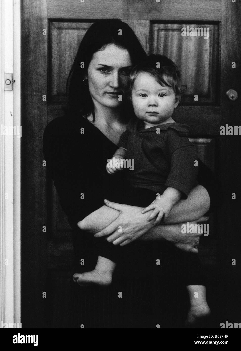 Young mother holding baby boy Stock Photo - Alamy Young mother holding baby boy Stock Photo - Alamy