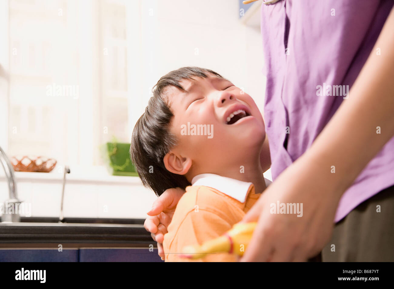 Side profile of a boy crying Stock Photo - Alamy