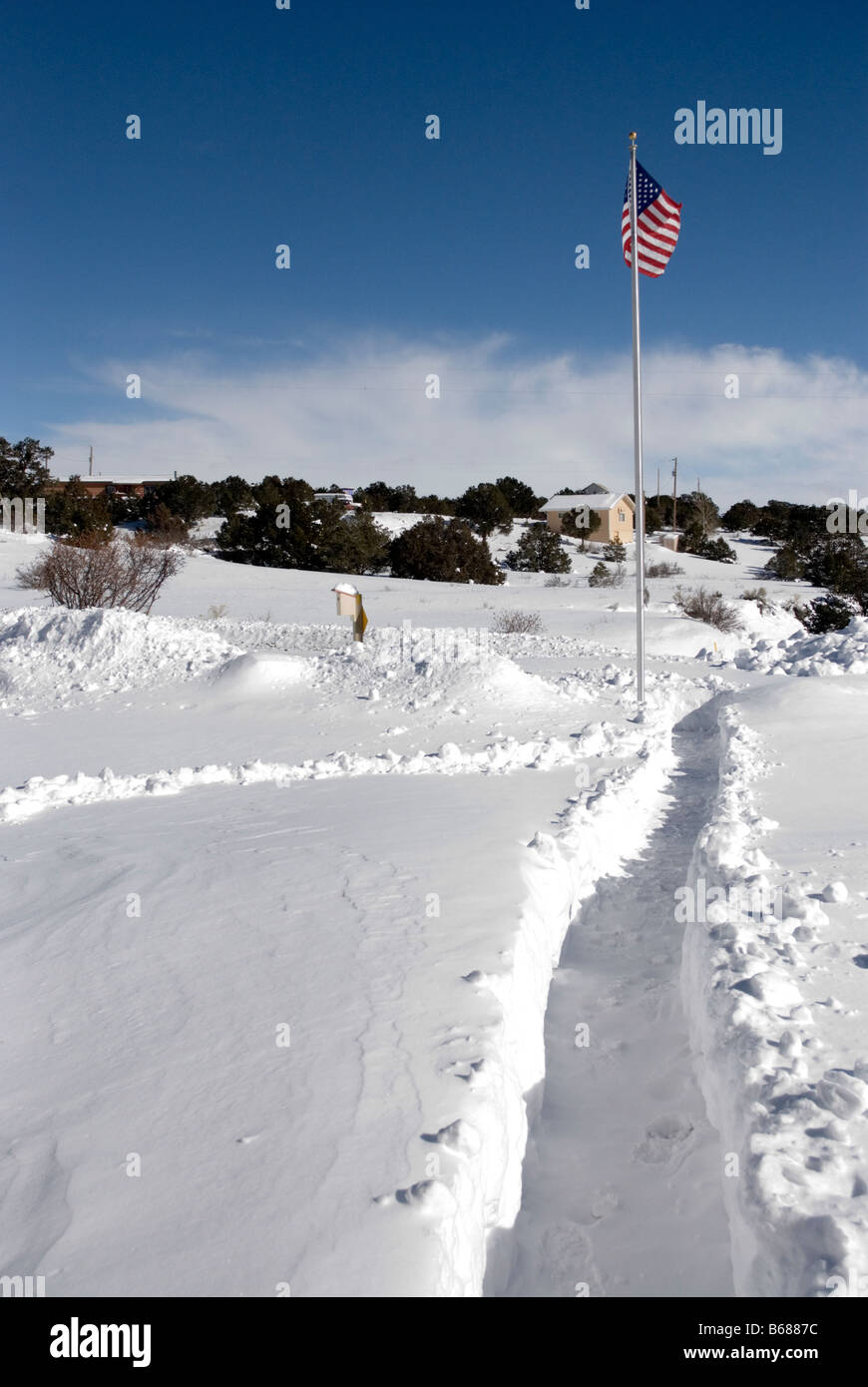 Path flag pole after snowfall San Luis Valley Colorado USA Stock Photo ...