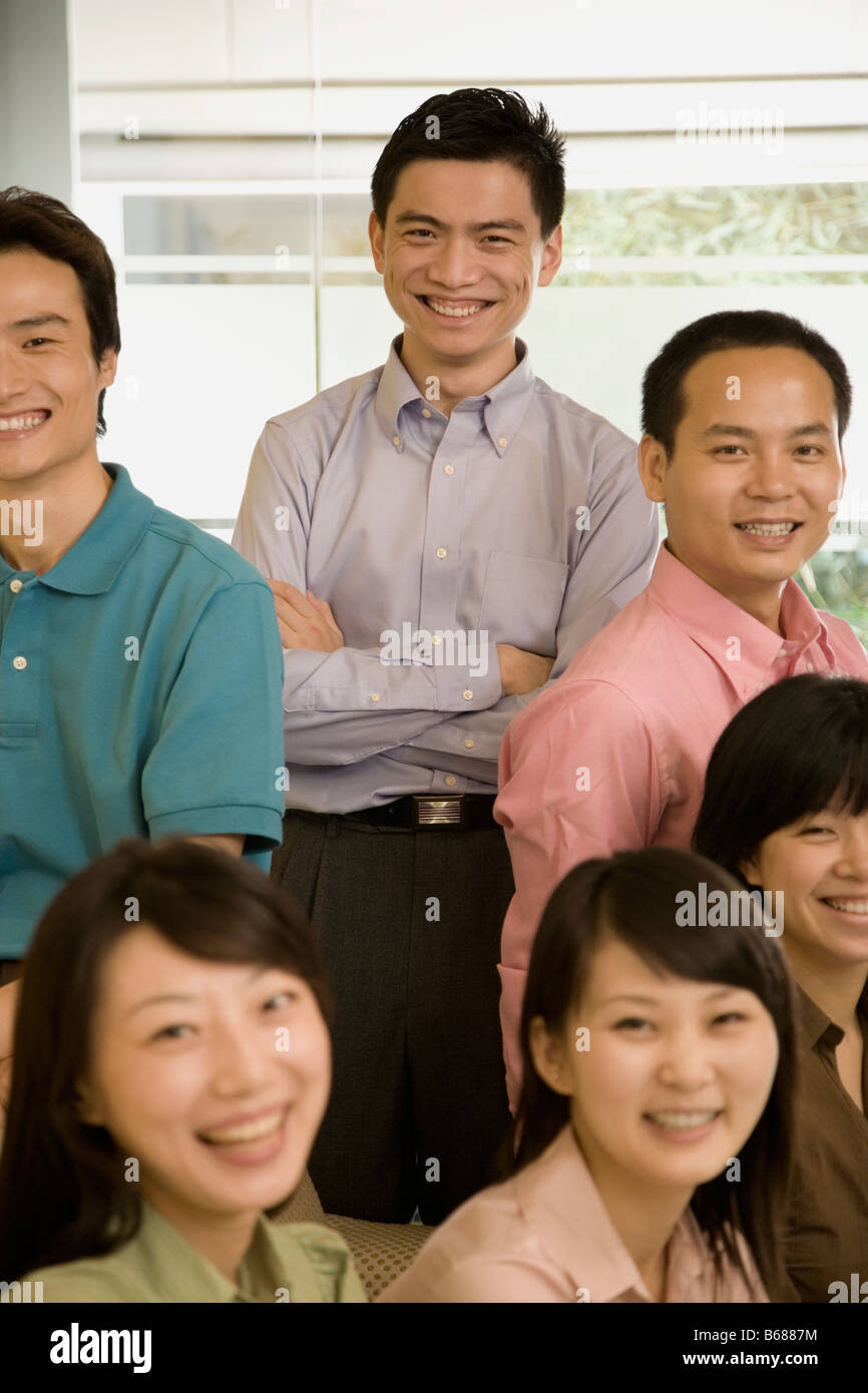 Portrait of a group of office workers smiling together Stock Photo - Alamy