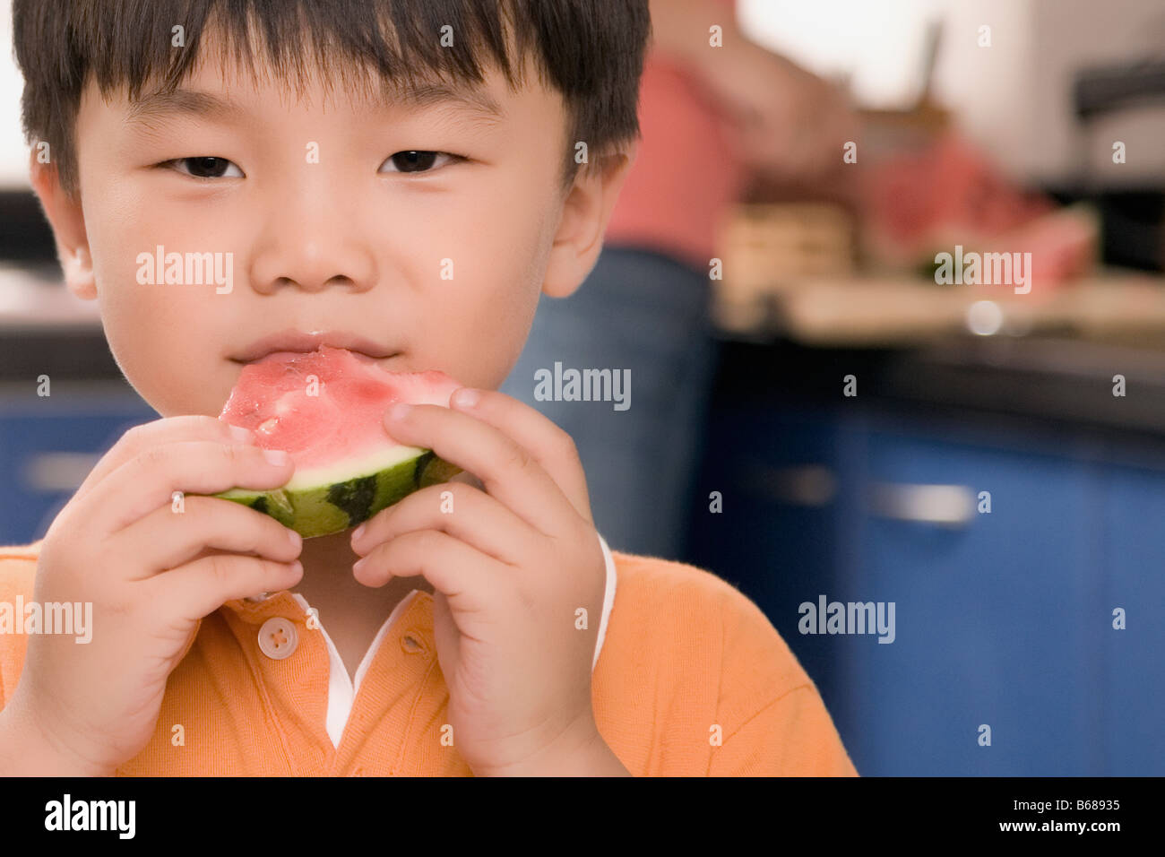 Chinese Boy Eating Fruit High Resolution Stock Photography and Images ...