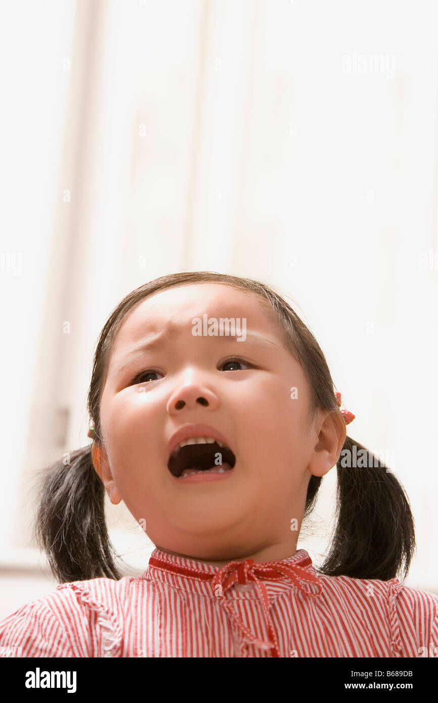 Close-up of a girl crying Stock Photo - Alamy