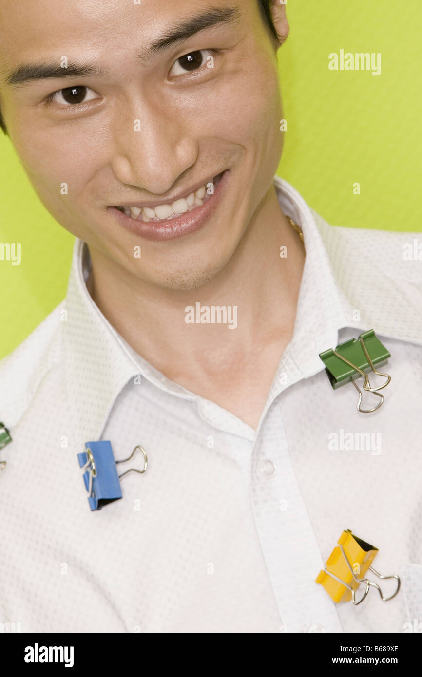 Portrait of a young man with paper clips on his shirt Stock Photo - Alamy