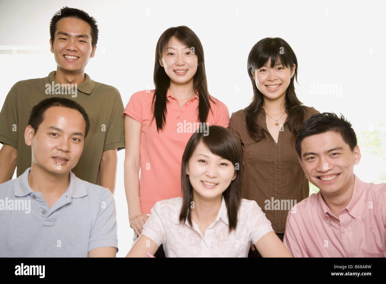 Smiling chinese workers hi-res stock photography and images - Alamy