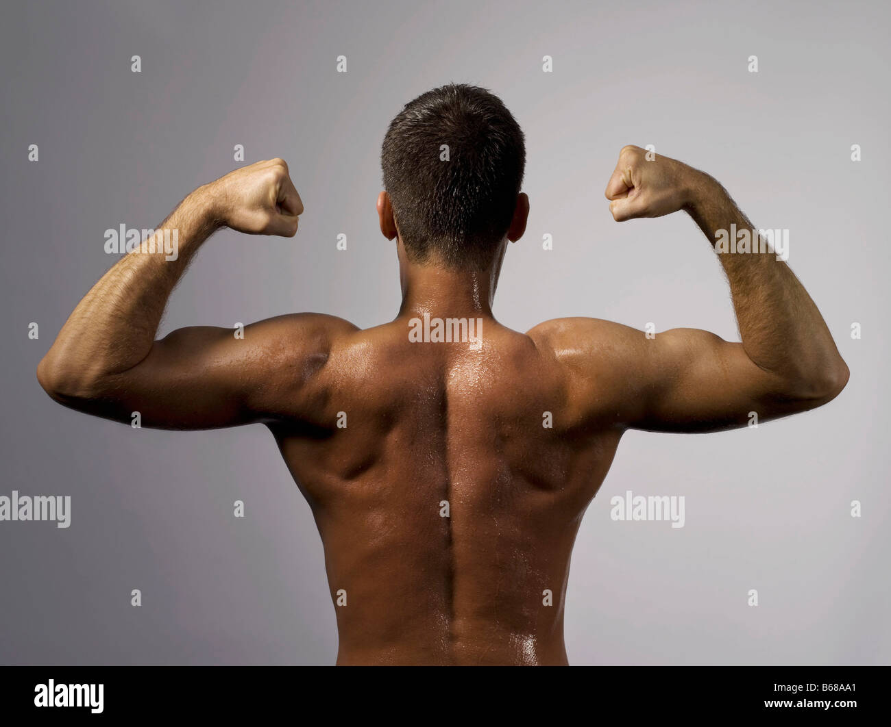 The back of a strong man Stock Photo - Alamy