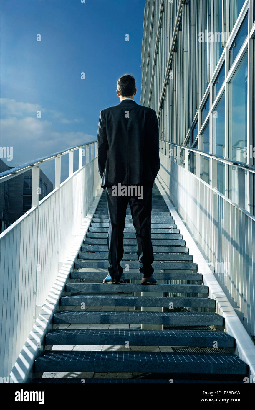Man standing in stairs, outdoors Stock Photo - Alamy