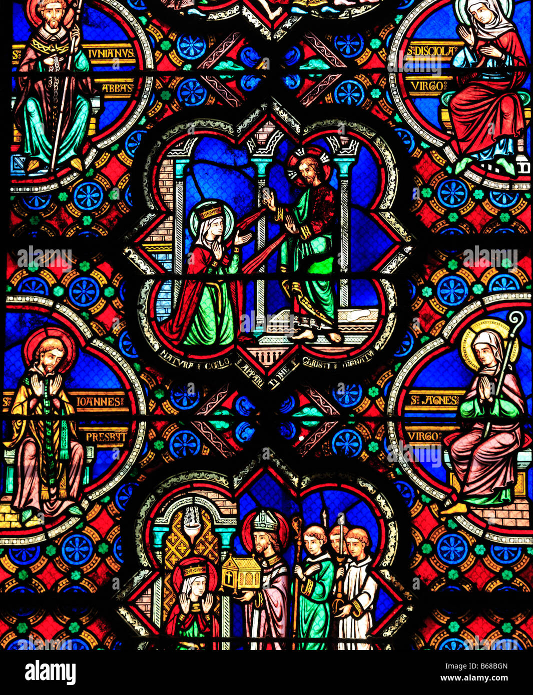 Romanesque coloured stained window, Glass painting in the church Sainte ...