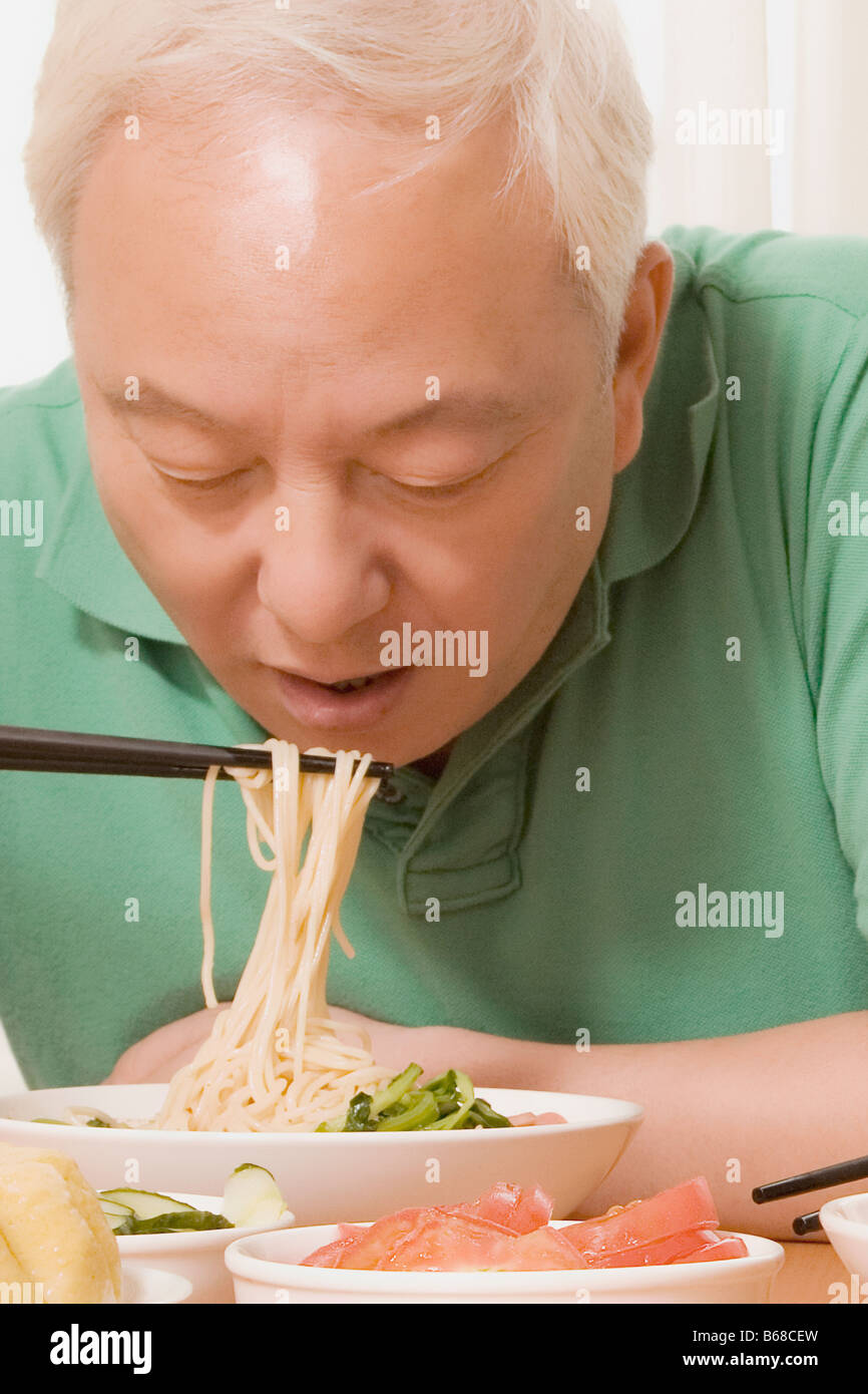 Fat chinese man food hi-res stock photography and images - Alamy