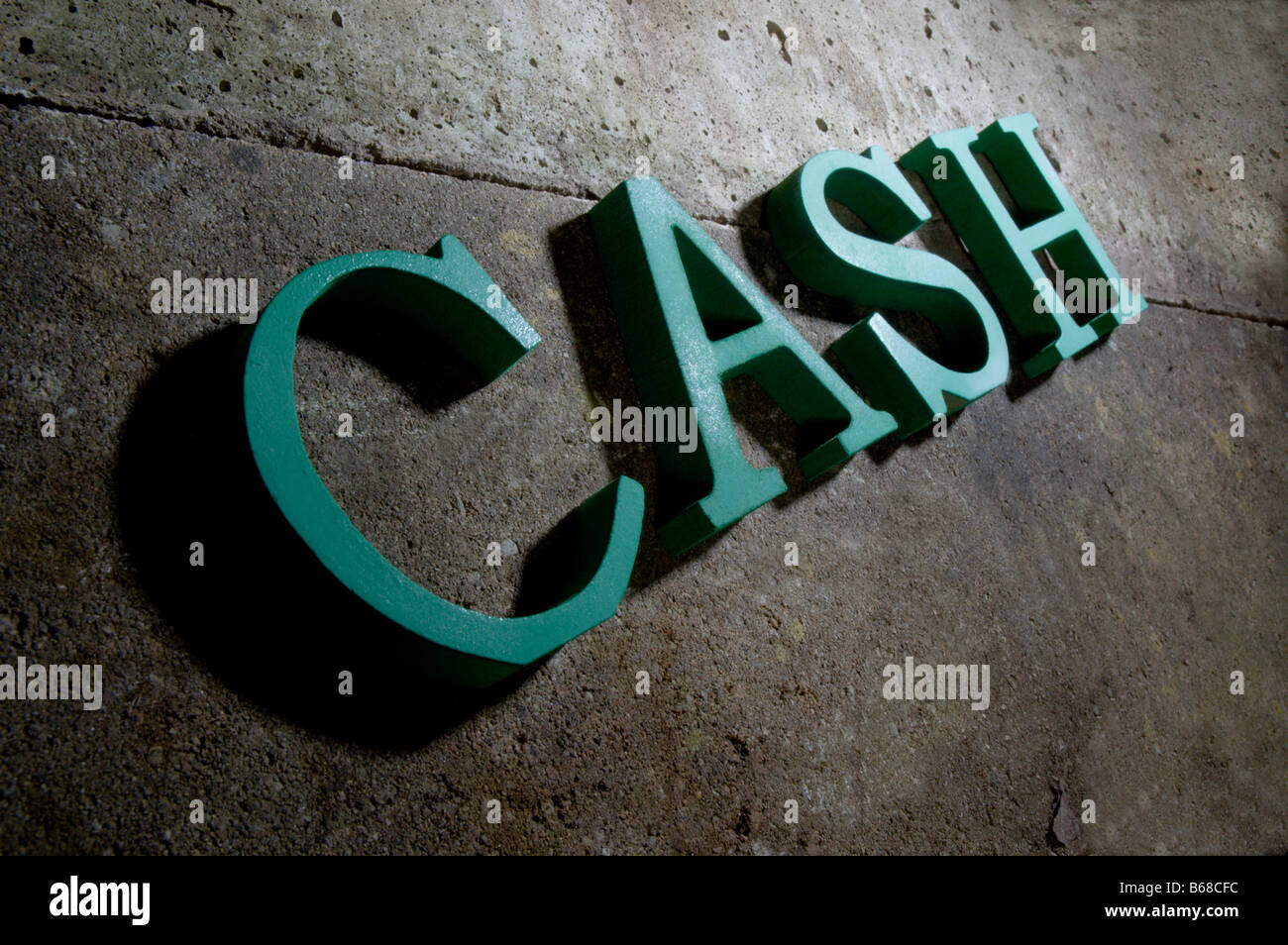 The word cash in green Stock Photo - Alamy