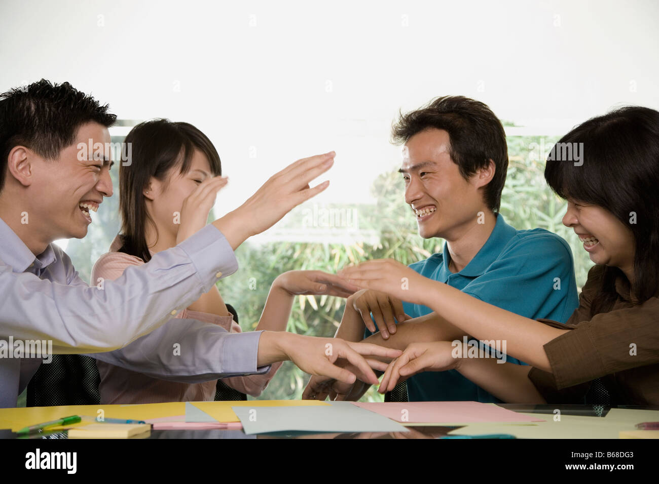 Office workers playing in an office Stock Photo - Alamy