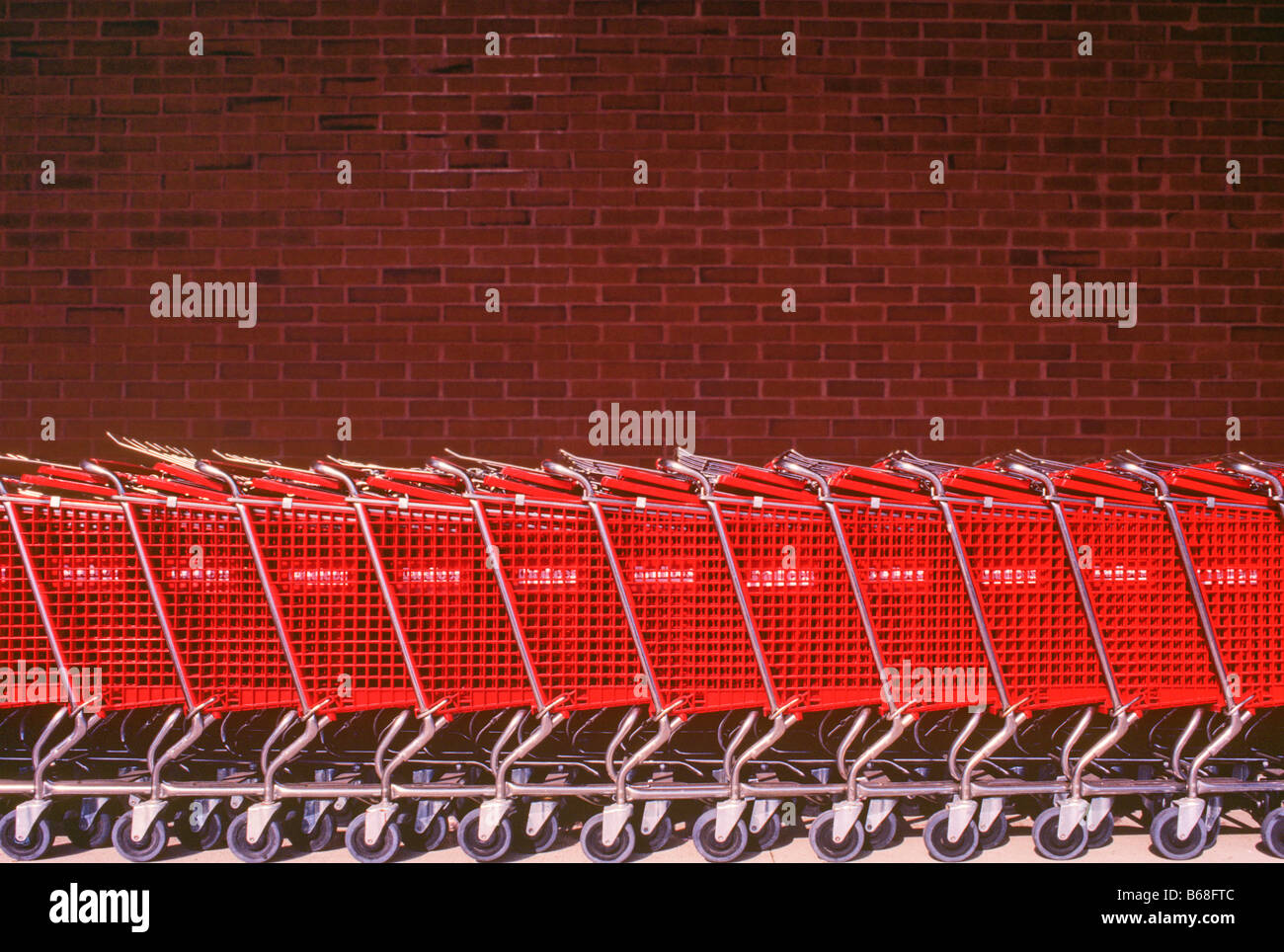 Red shopping carts Stock Photo - Alamy