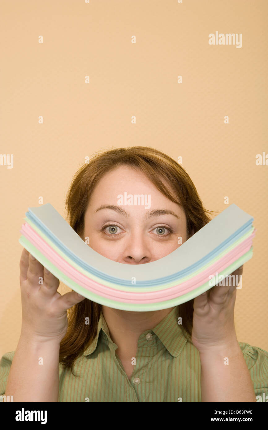 Stack of papers colour background hi-res stock photography and images ...