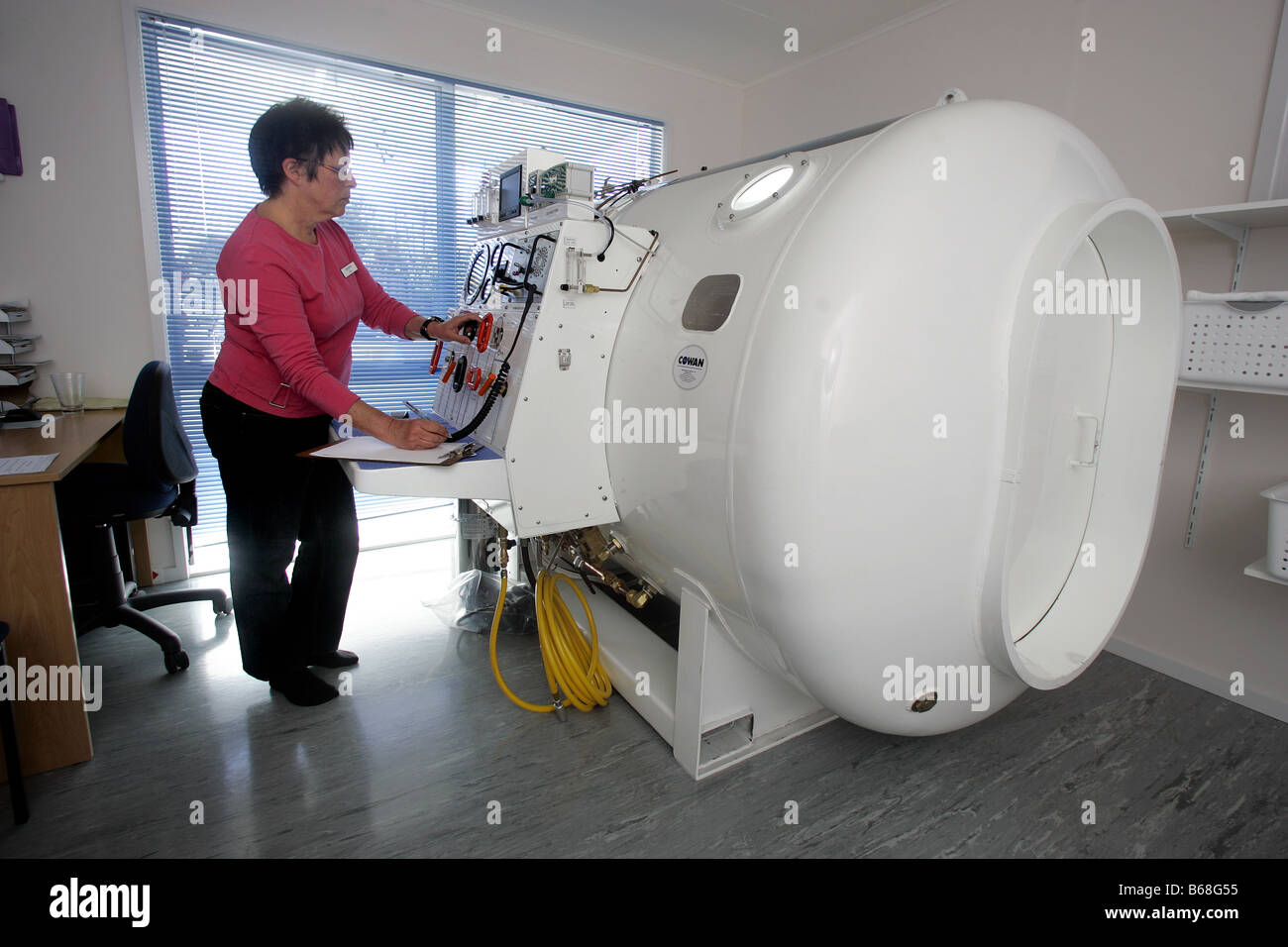 a nurse monitors a hyperbaric chamber at Mapua Health Centre, Nelson ...