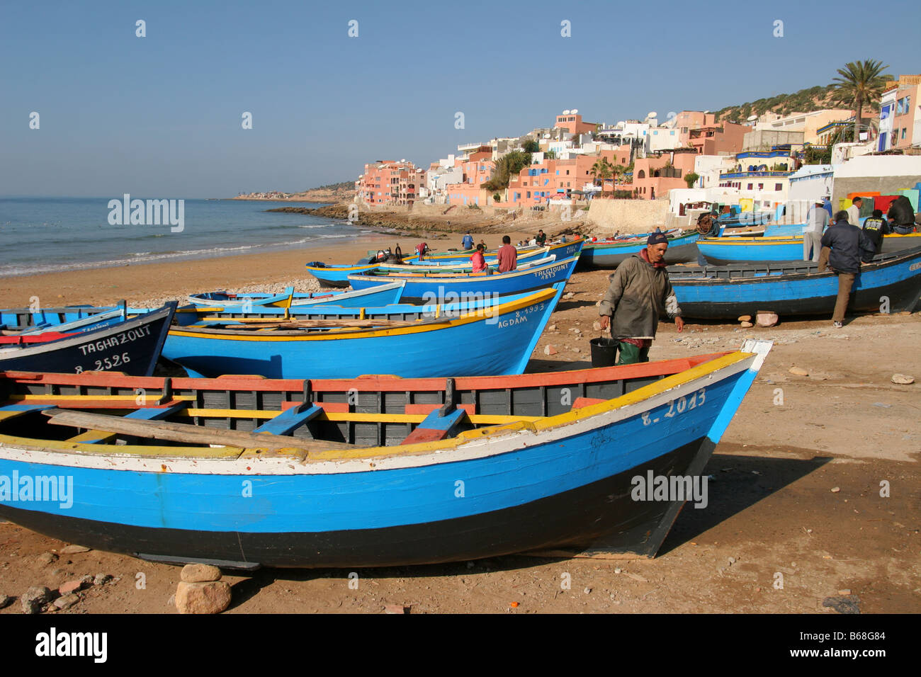 Traditional blue fishing boats in Taghazout, Morocco Stock Photo - Alamy
