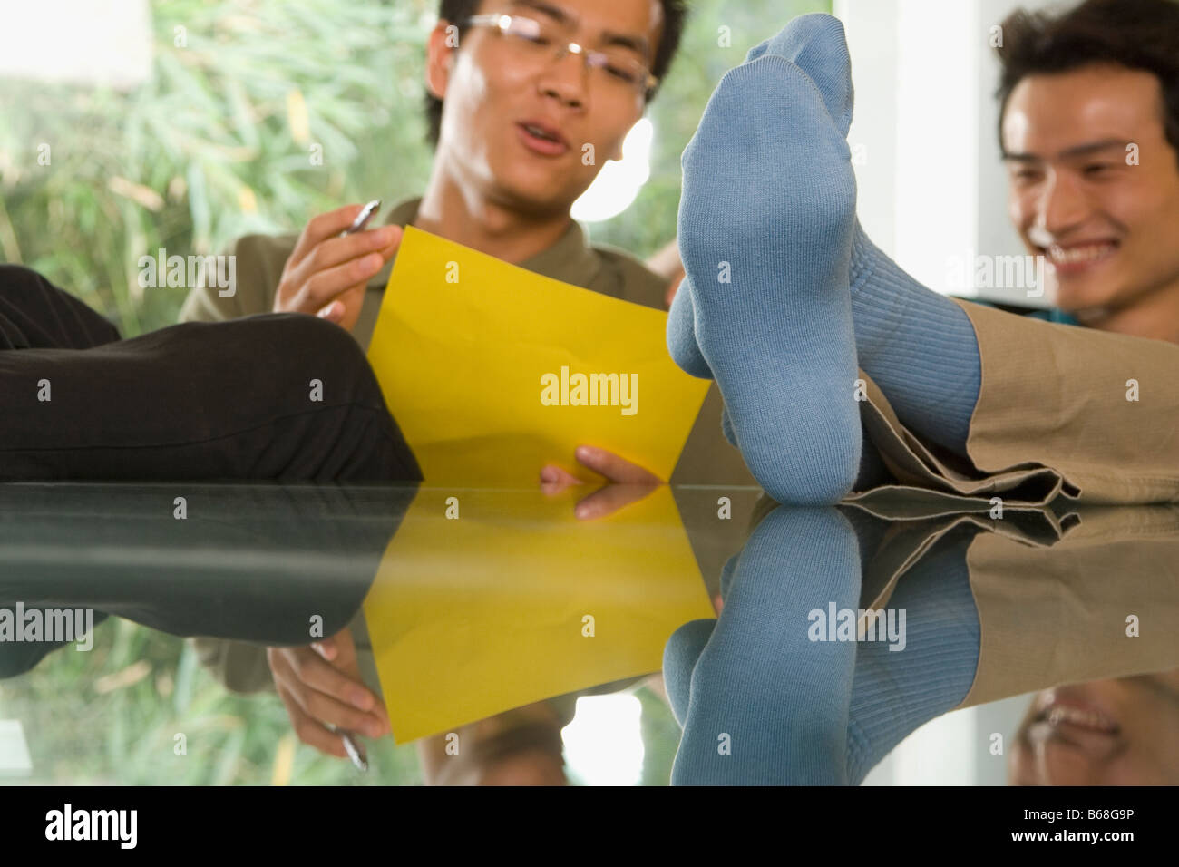 Office workers relaxing in an office Stock Photo - Alamy