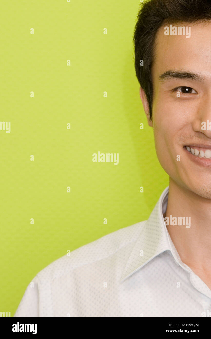 Portrait of a young man smiling Stock Photo - Alamy