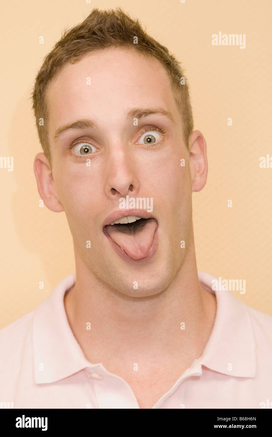 Man Tongue Out High Resolution Stock Photography and Images - Alamy