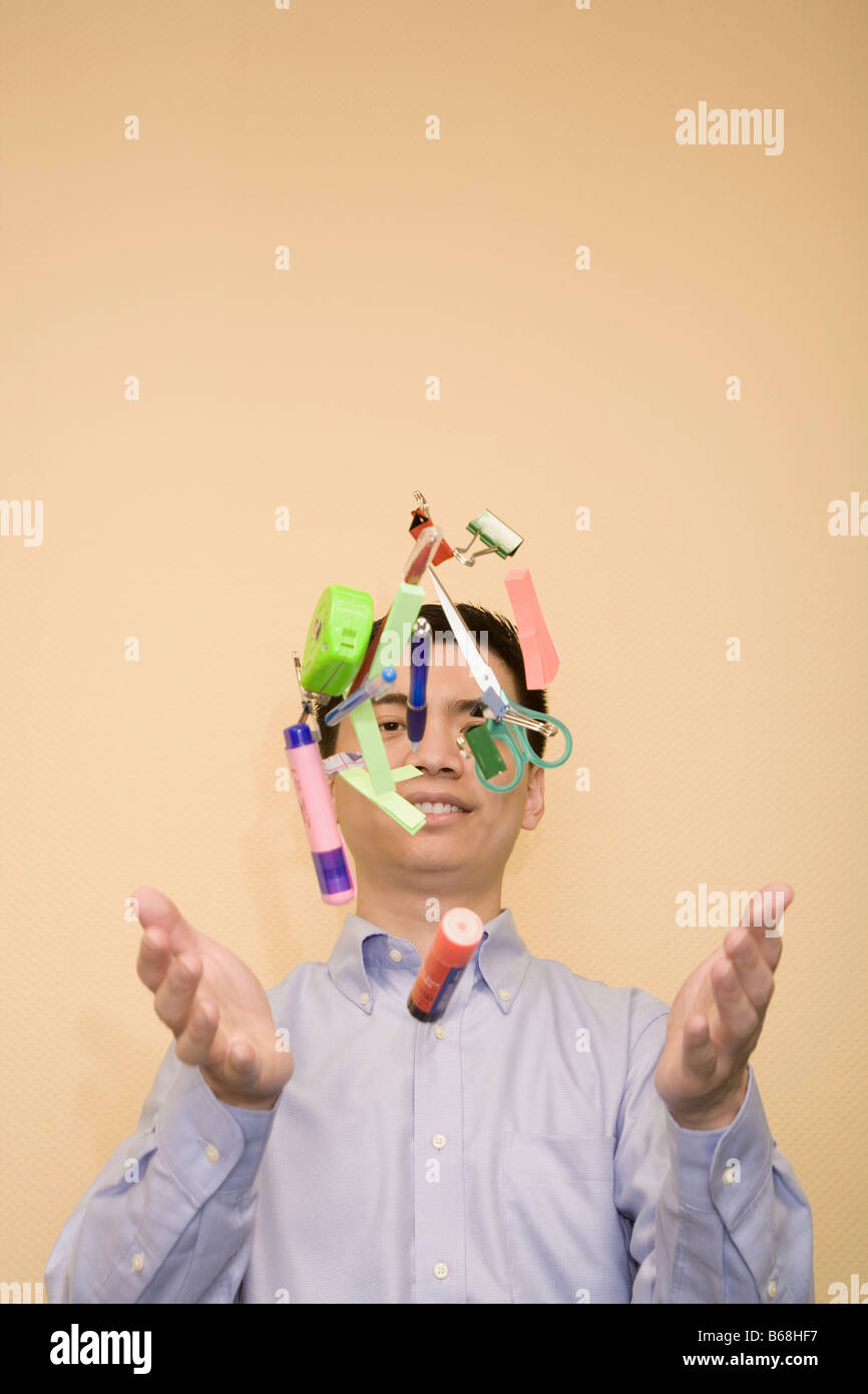 Young chinese businessman writing down hi-res stock photography and ...
