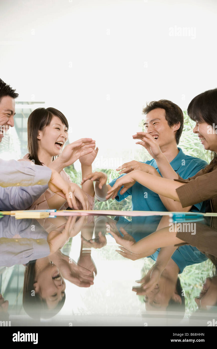 Office workers playing in an office Stock Photo - Alamy
