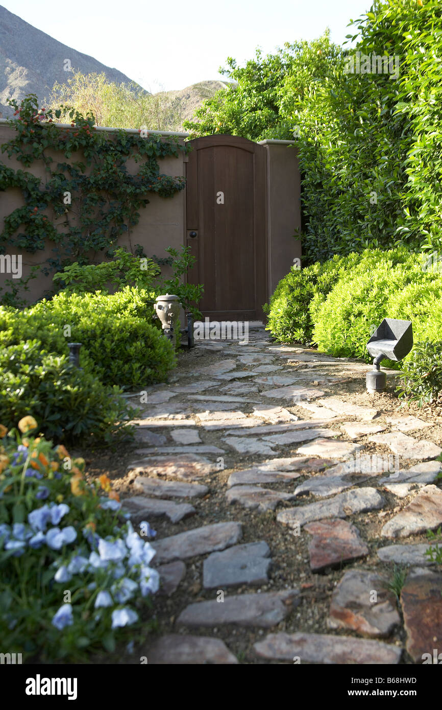 Garden pathway to gate Stock Photo - Alamy