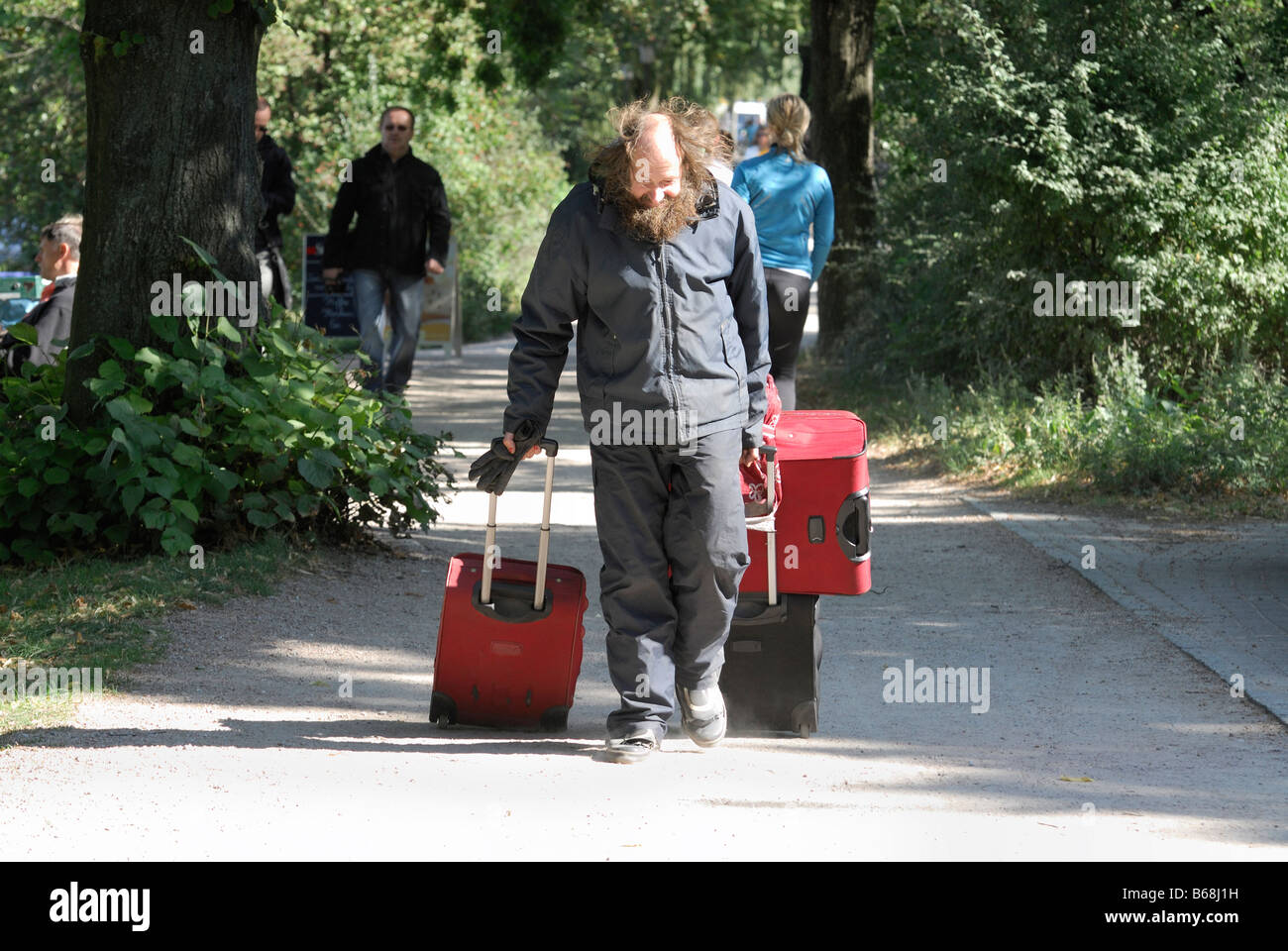 German homeless carries his belongins Hamburg Germany Stock Photo - Alamy