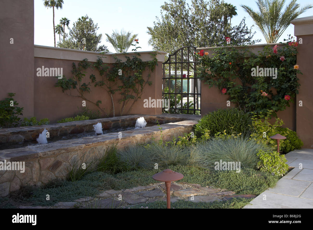 Courtyard fountain with seating area hi-res stock photography and ...