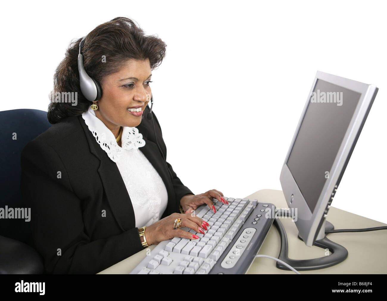 An attractive Indian technical support specialist sitting at the ...