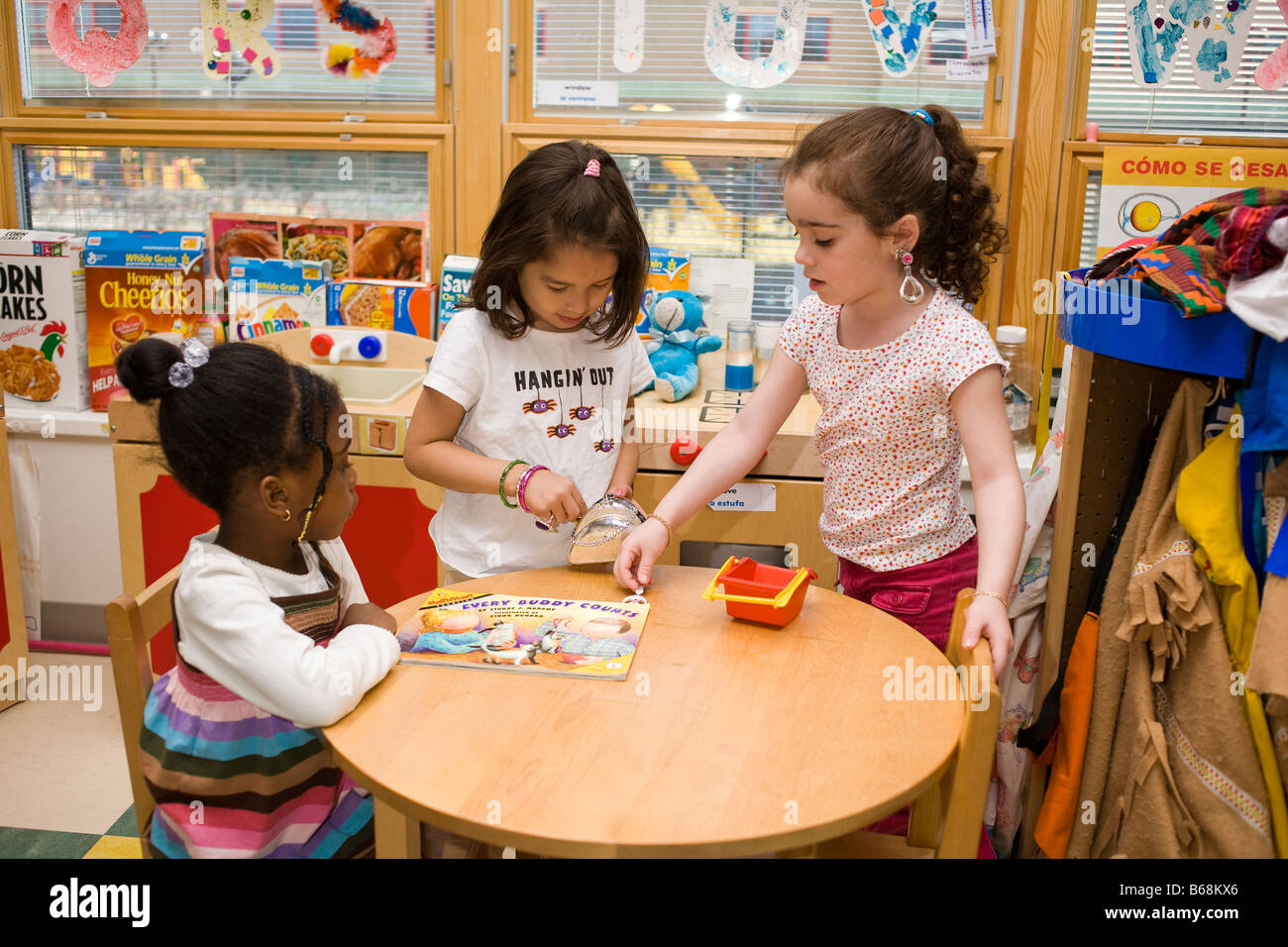 Three 4 year old preschool girls Stock Photo - Alamy