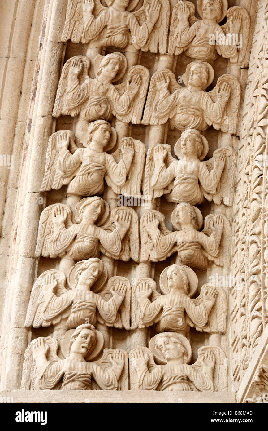 Romanesque stone bas relief on portal of the Saint Trophimus cathedral ...