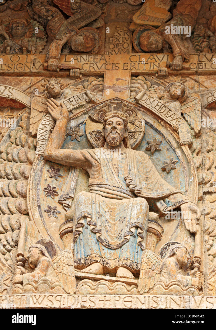 Romanesque sculpture, stone carved bas relief on portal of Sainte Foy ...