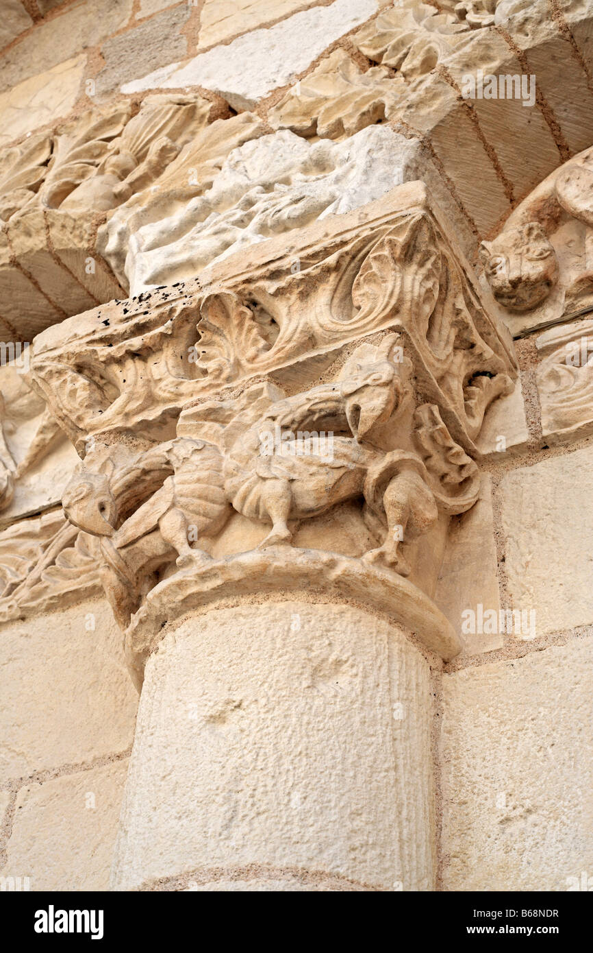 Romanesque stone bas relief on portal of the cathedral Notre Dame la ...