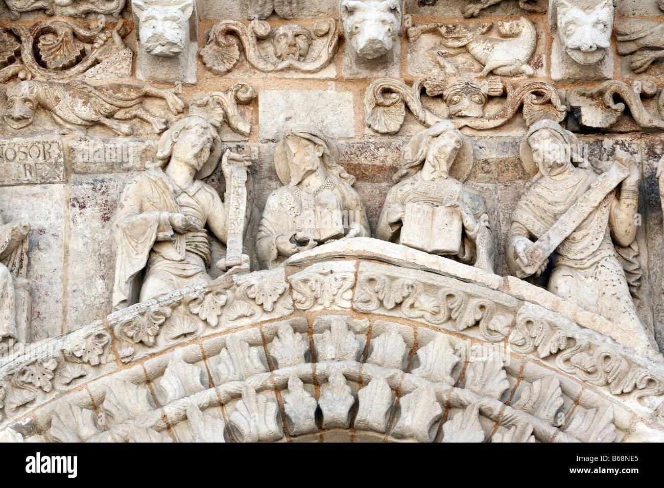 Romanesque stone bas relief on portal of the cathedral Notre Dame la ...